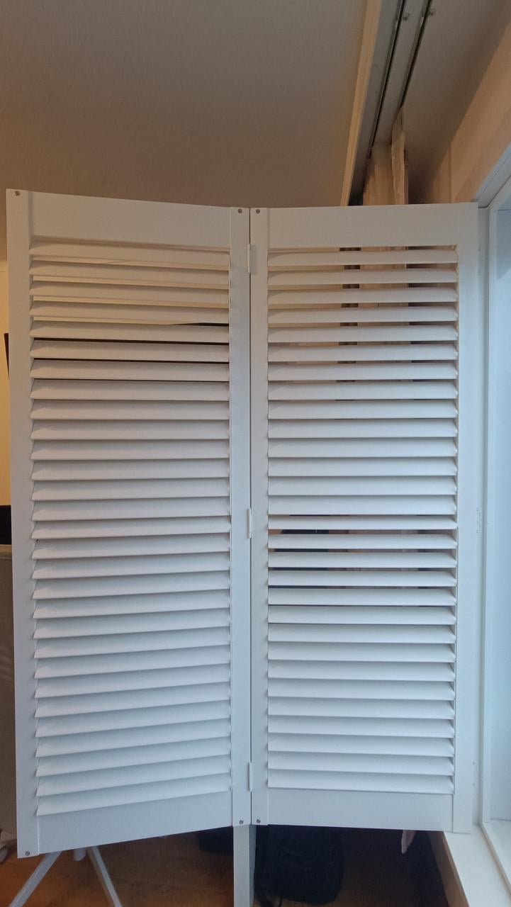 Houte shutters binnen