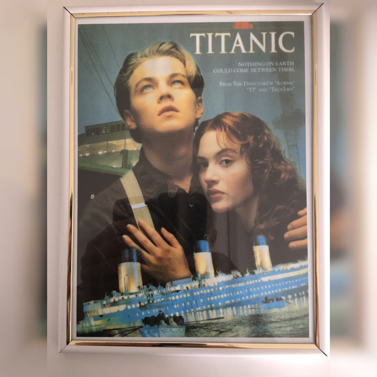 Poster met afbeelding van Leonardo DiCaprio en Kate Winslet