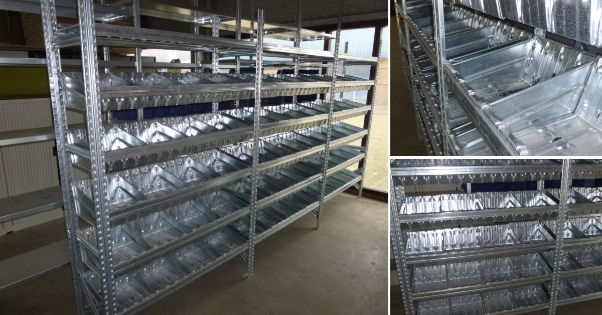 Verzinkte magazijnstelling met voorraad bakjes en verdeelschotjes